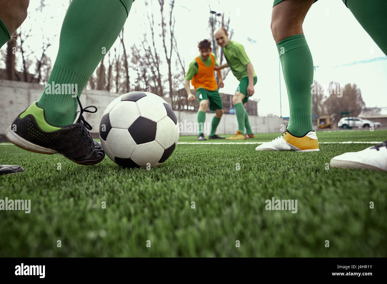 The legs of soccer football player Stock Photo - Alamy