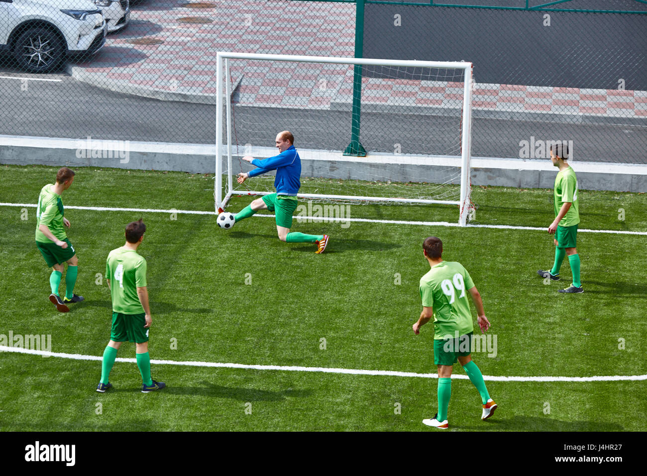 Soccer football goalkeeper making diving save Stock Photo - Alamy