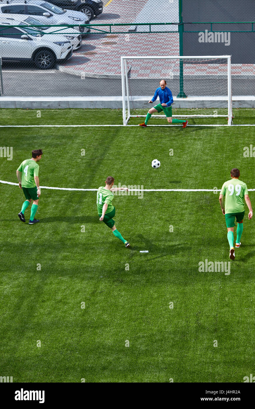 Soccer football goalkeeper making diving save Stock Photo - Alamy