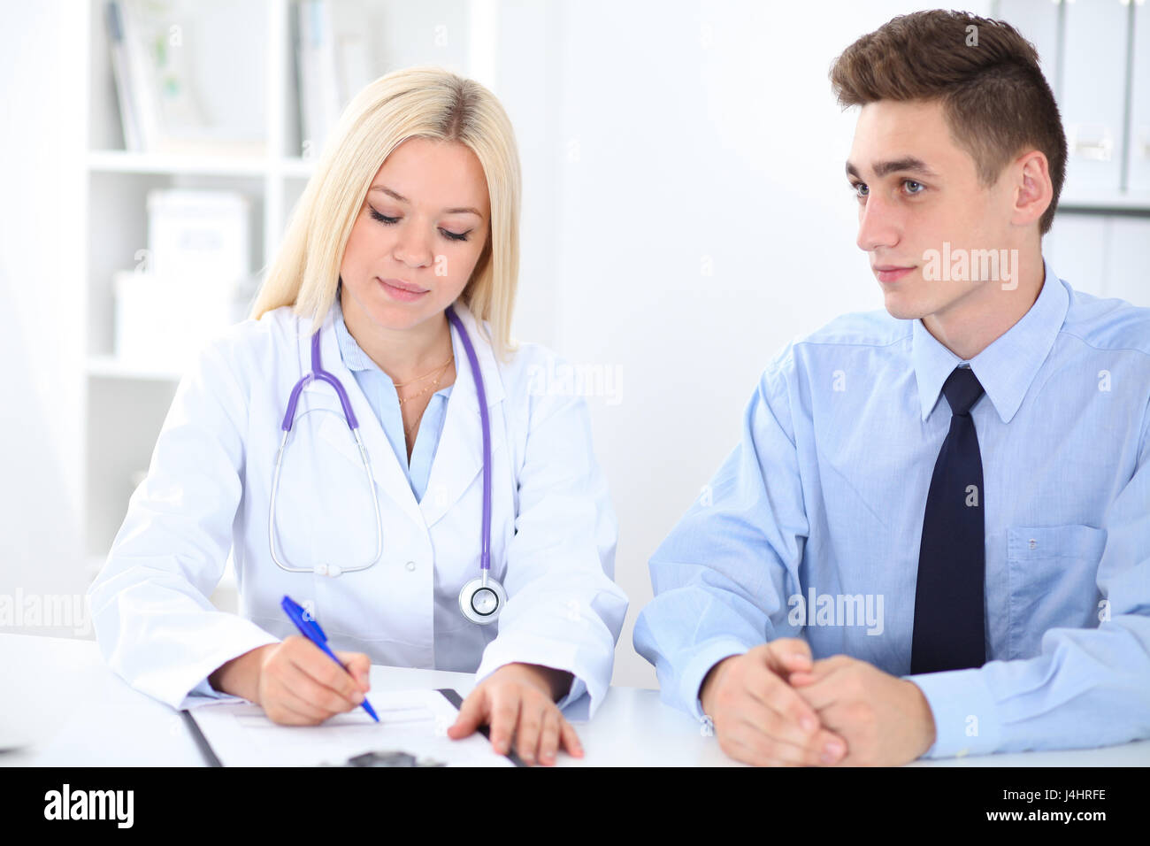 Doctor and patient in hospital. Medicine concept Stock Photo - Alamy