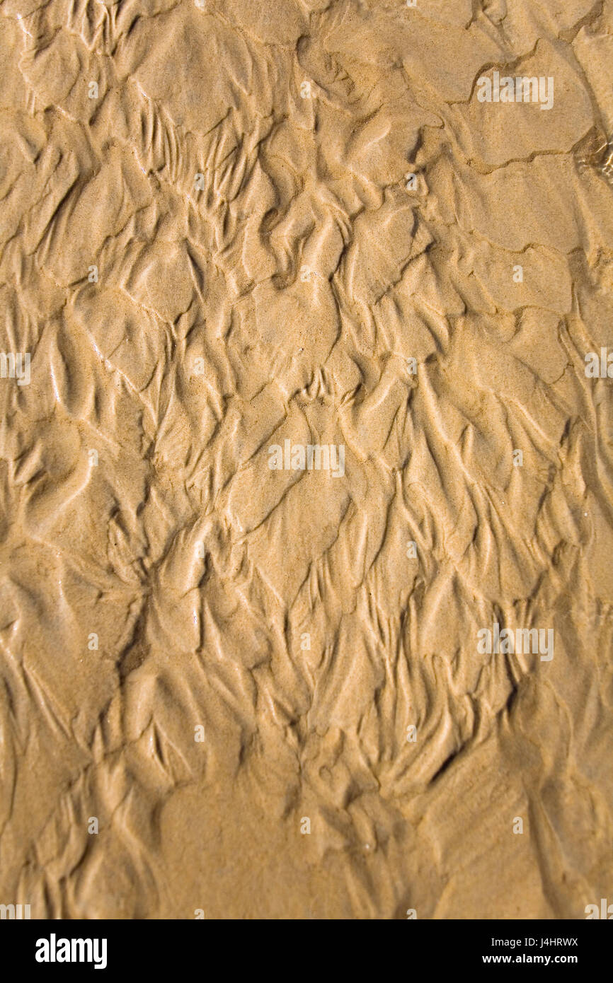 Beautiful patterns on the sand made by the creek Stock Photo - Alamy