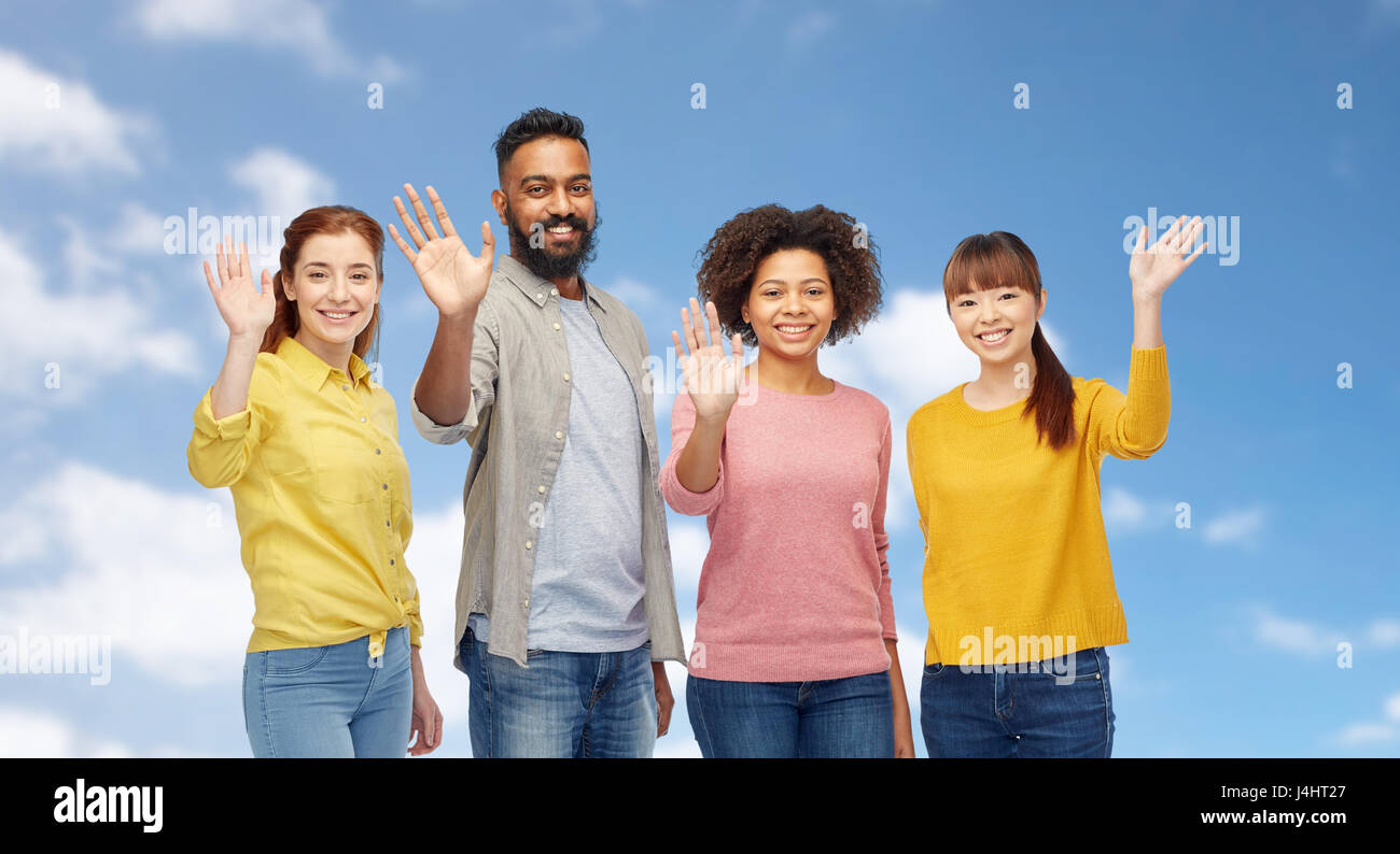 international group of happy people waving hands Stock Photo - Alamy