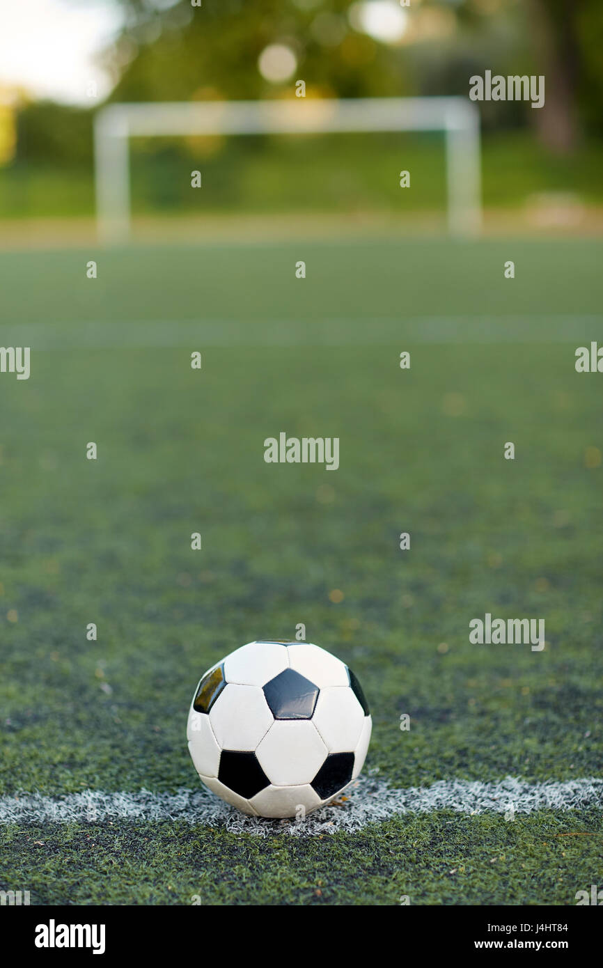 soccer ball on football field marking line Stock Photo - Alamy