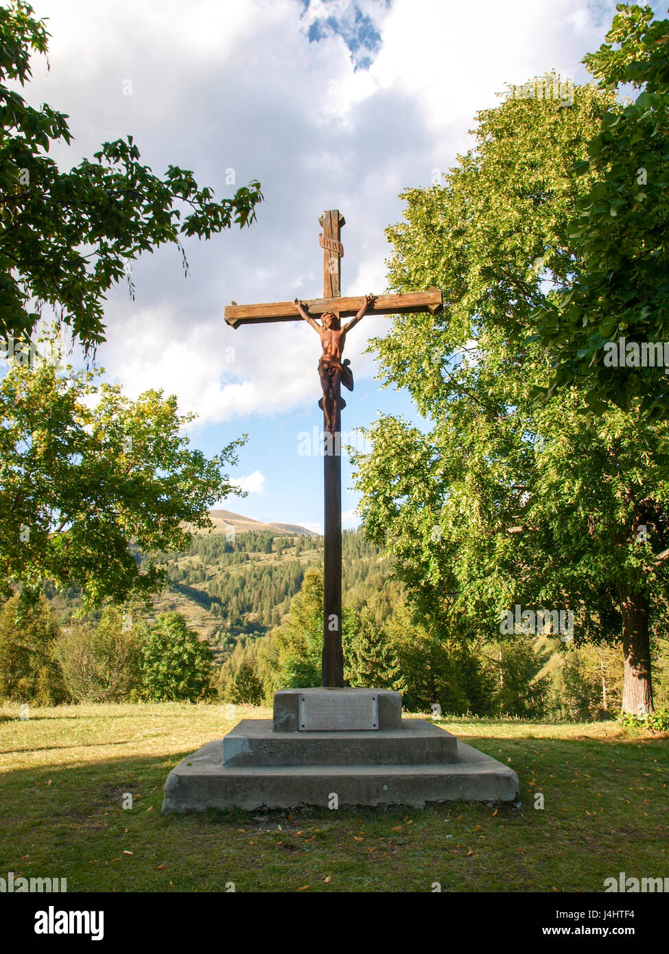 France: Cross with Christ in the public park Stock Photo - Alamy