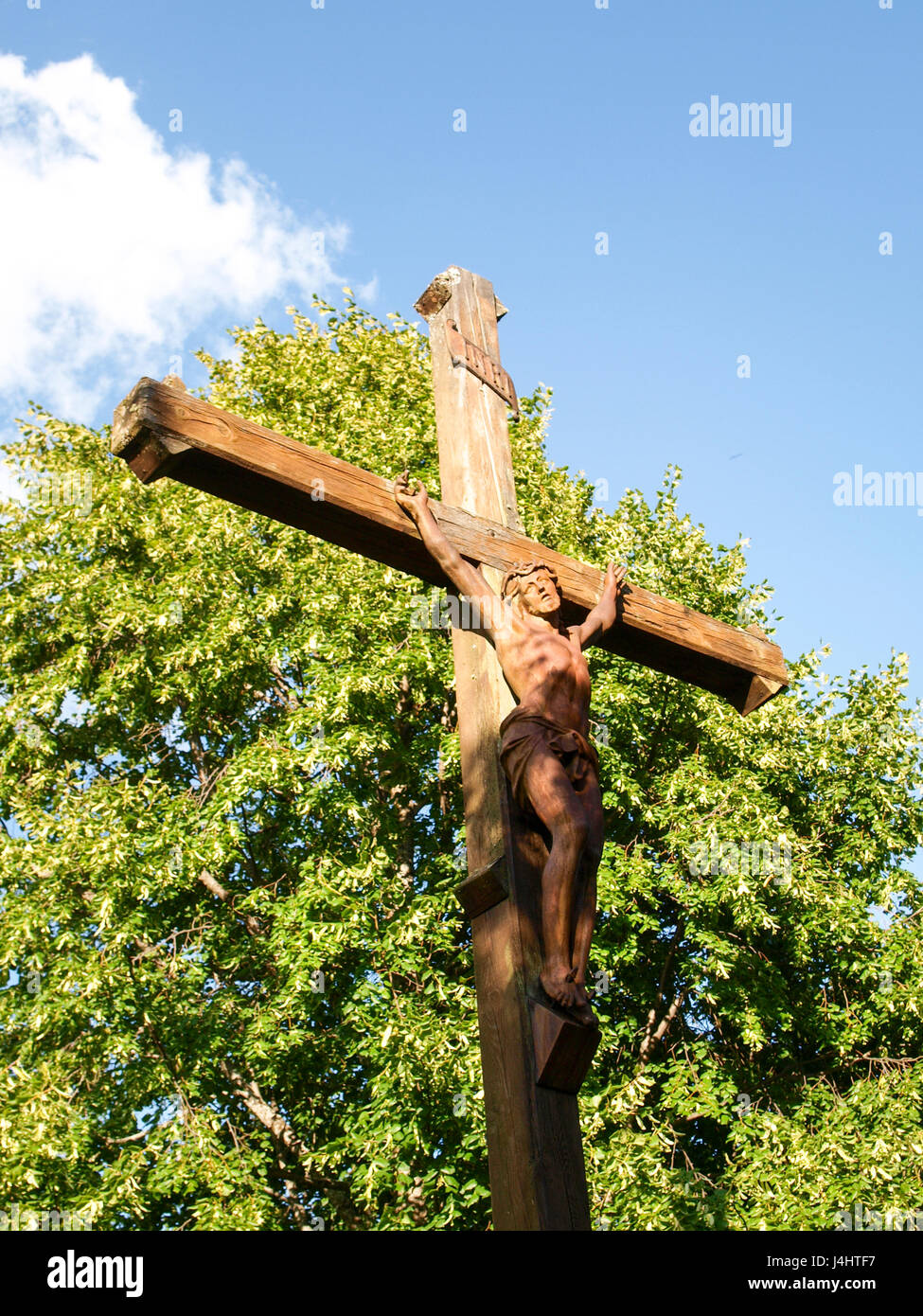 France: Cross with Christ in the public park Stock Photo - Alamy