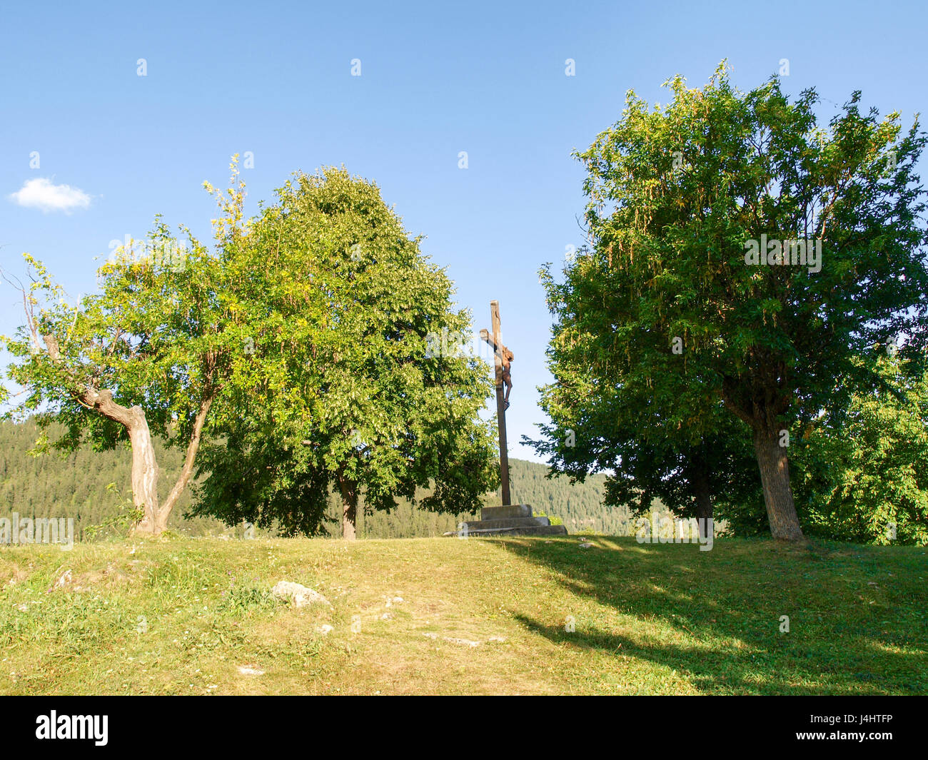 France: Cross with Christ in the public park Stock Photo - Alamy