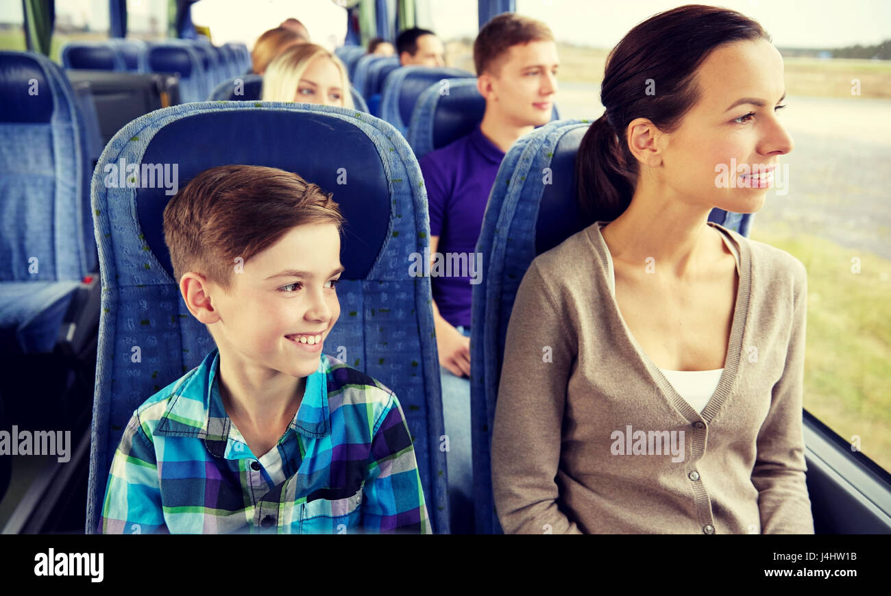 happy family riding in travel bus Stock Photo - Alamy
