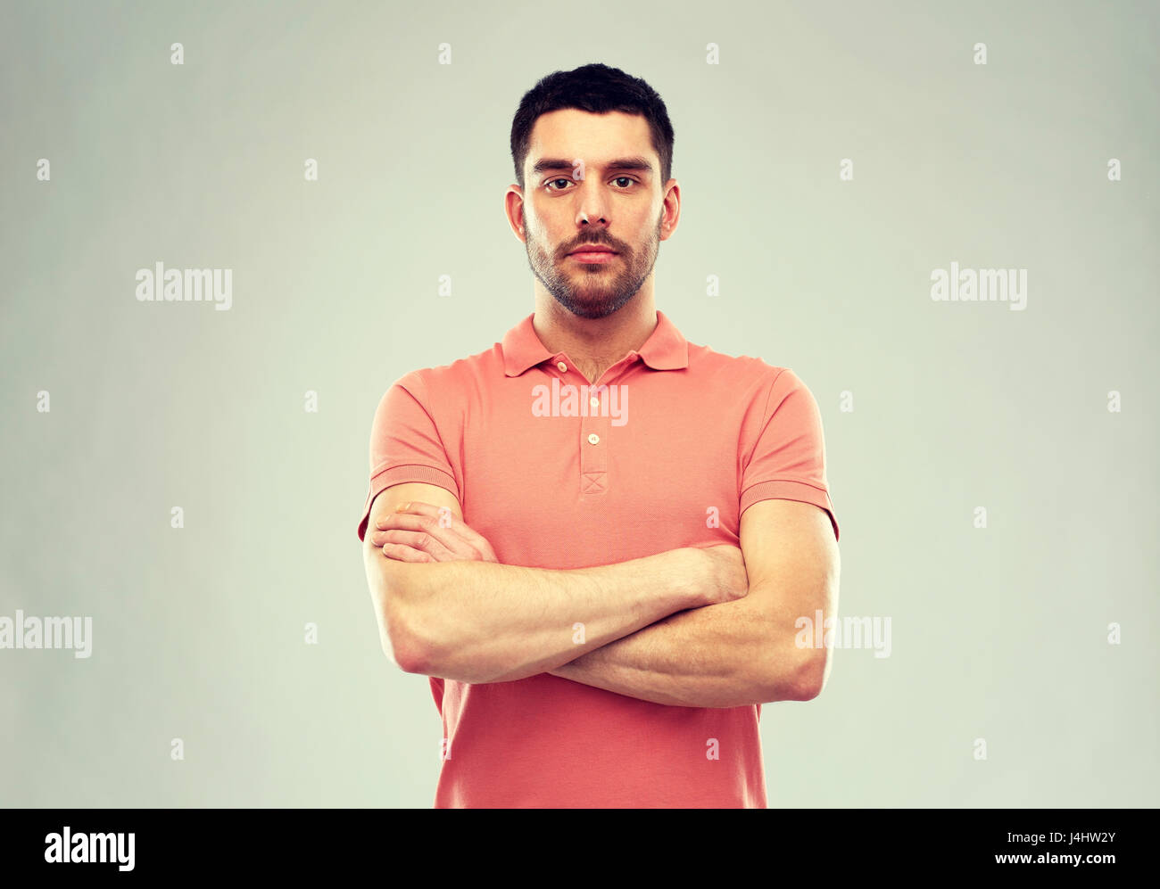 Portrait fit man crossed arms hi-res stock photography and images - Alamy