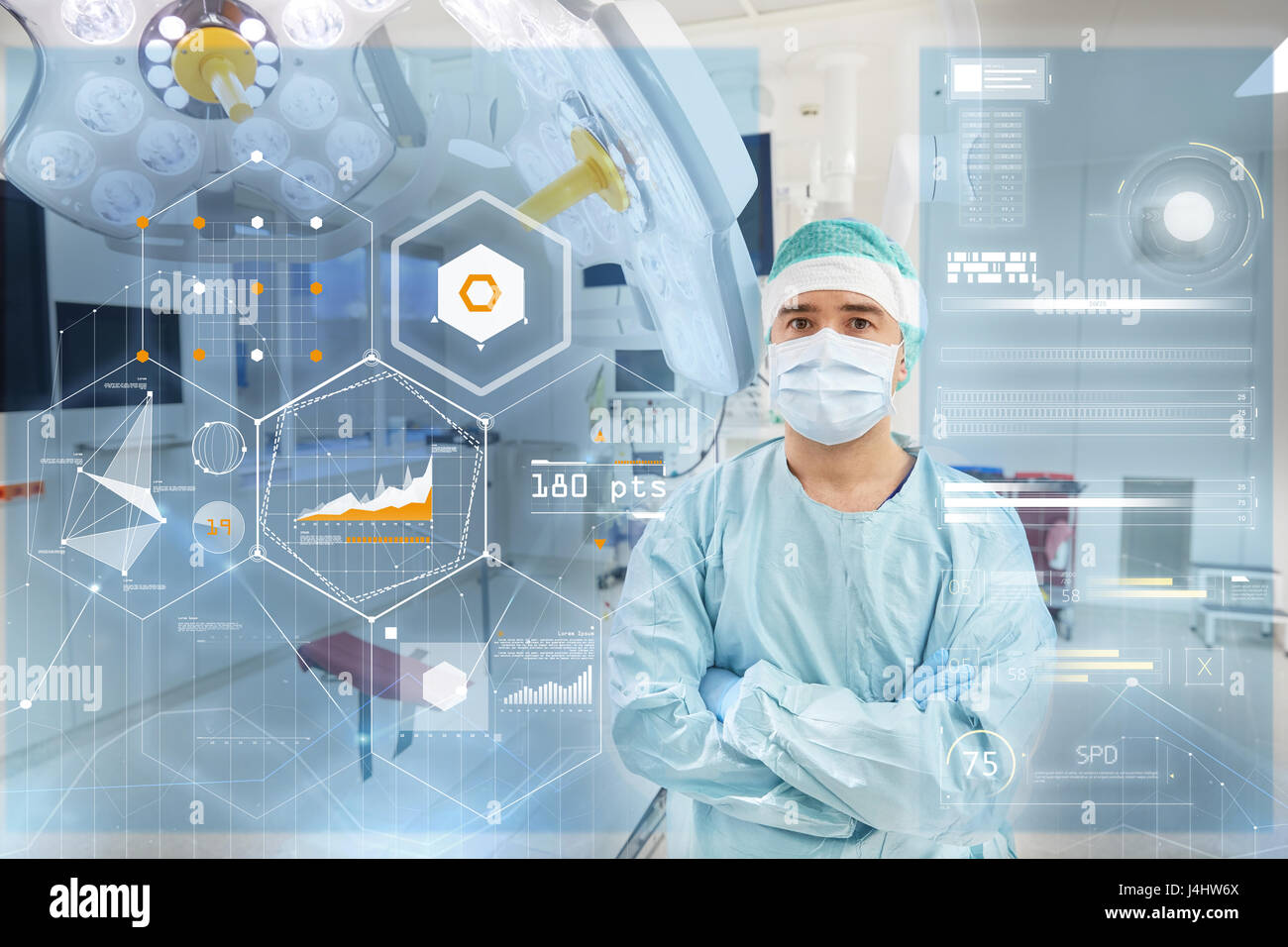 surgeon in operating room at hospital with charts Stock Photo - Alamy