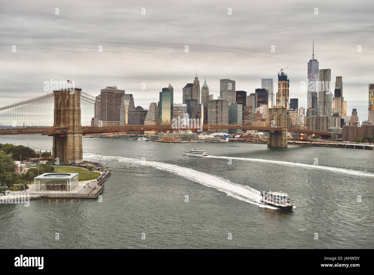 Manhattan skyline with Brooklyn Bridge at twilight - HDR image Stock ...