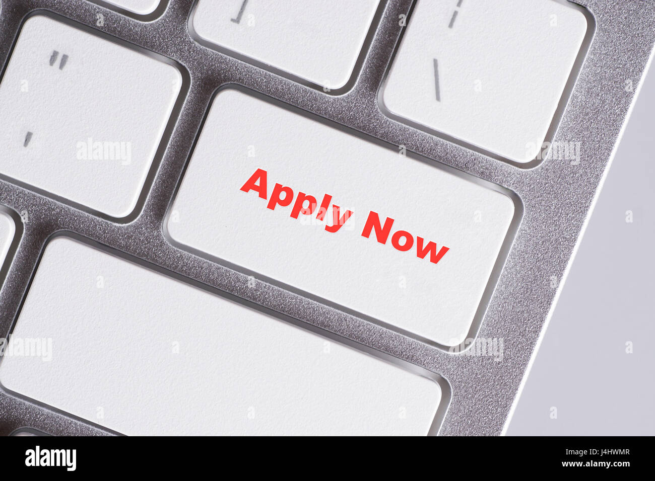 "Apply Now" red words on white keyboard - online, education and ...