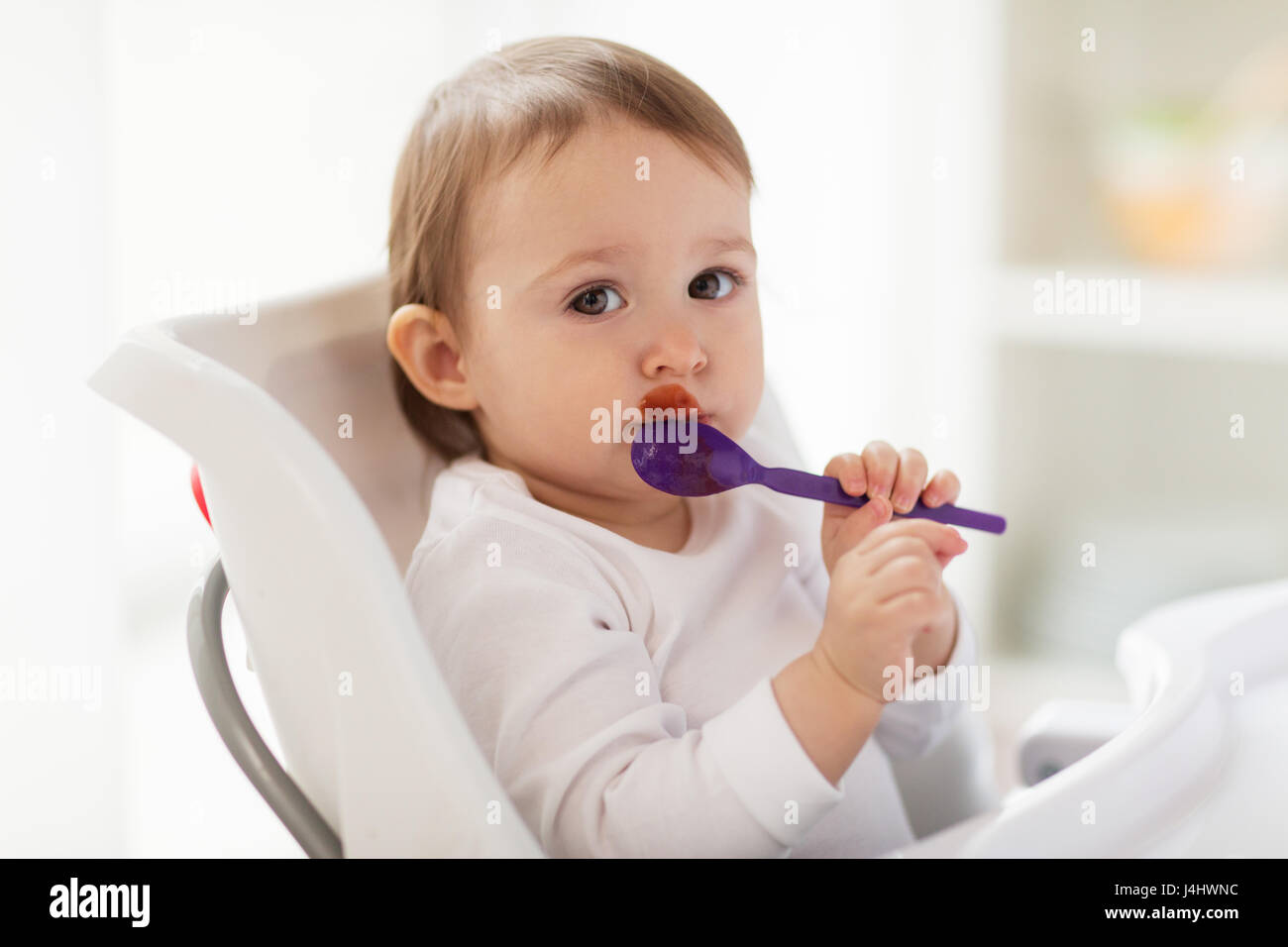 Spoon eating hi-res stock photography and images - Alamy