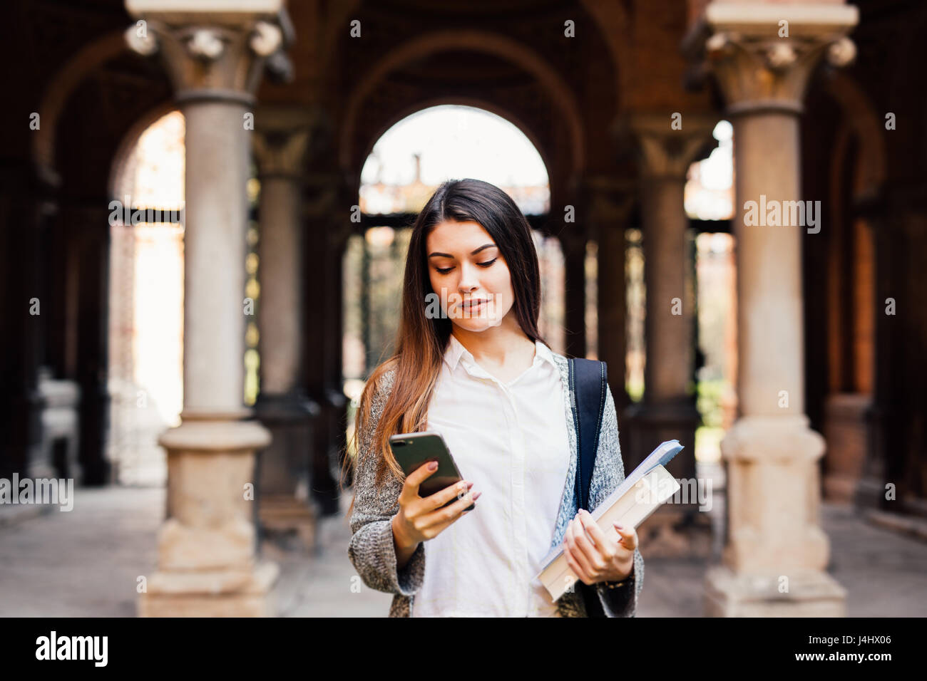 Smiling student notebooks folder hi-res stock photography and images ...