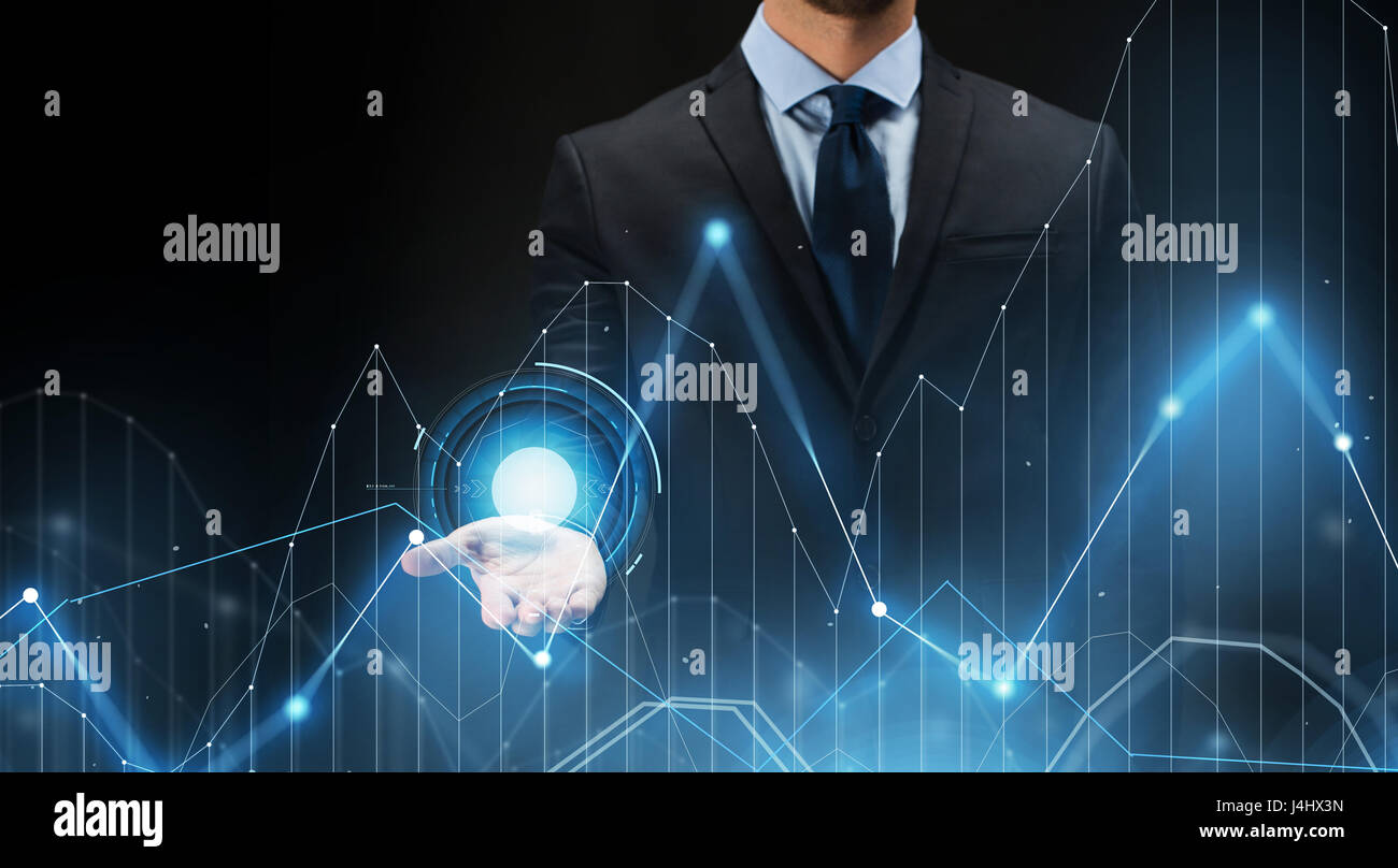 businessman with virtual diagram chart projection Stock Photo - Alamy