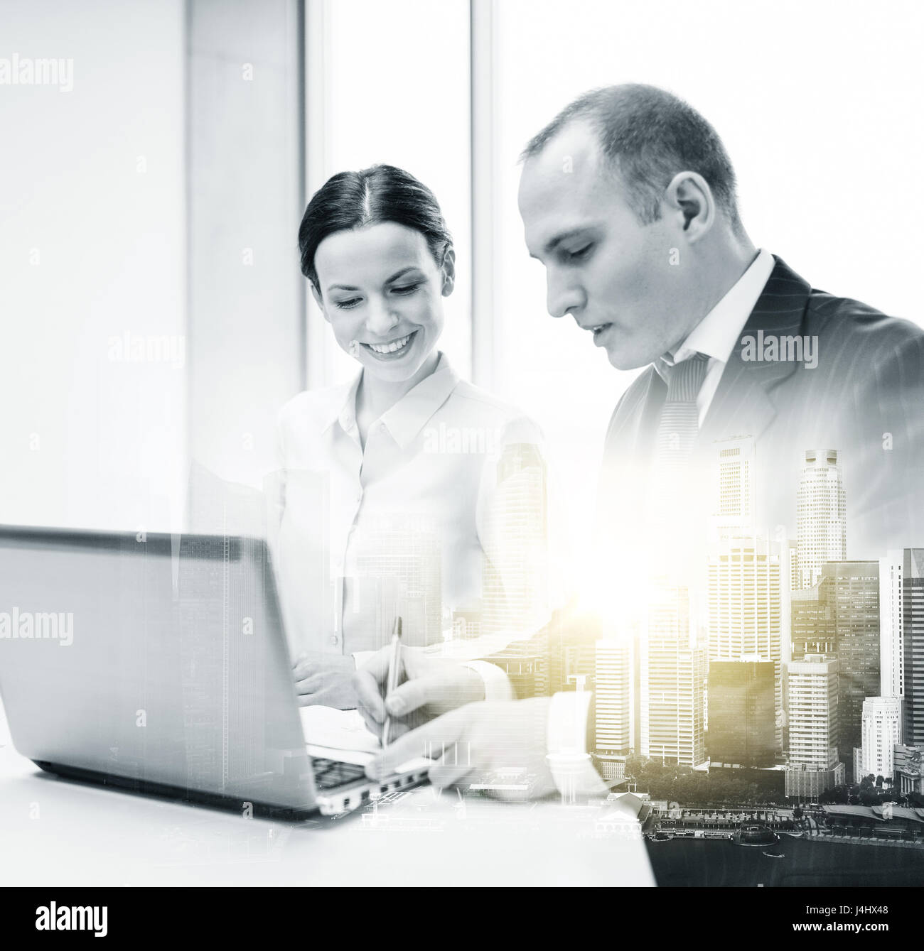 Young man woman signing contract hi-res stock photography and images ...