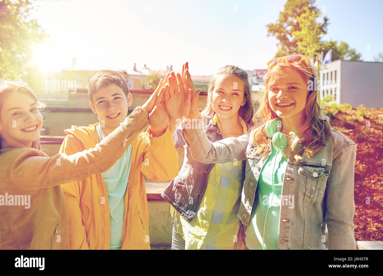 Friends high five young hi-res stock photography and images - Alamy