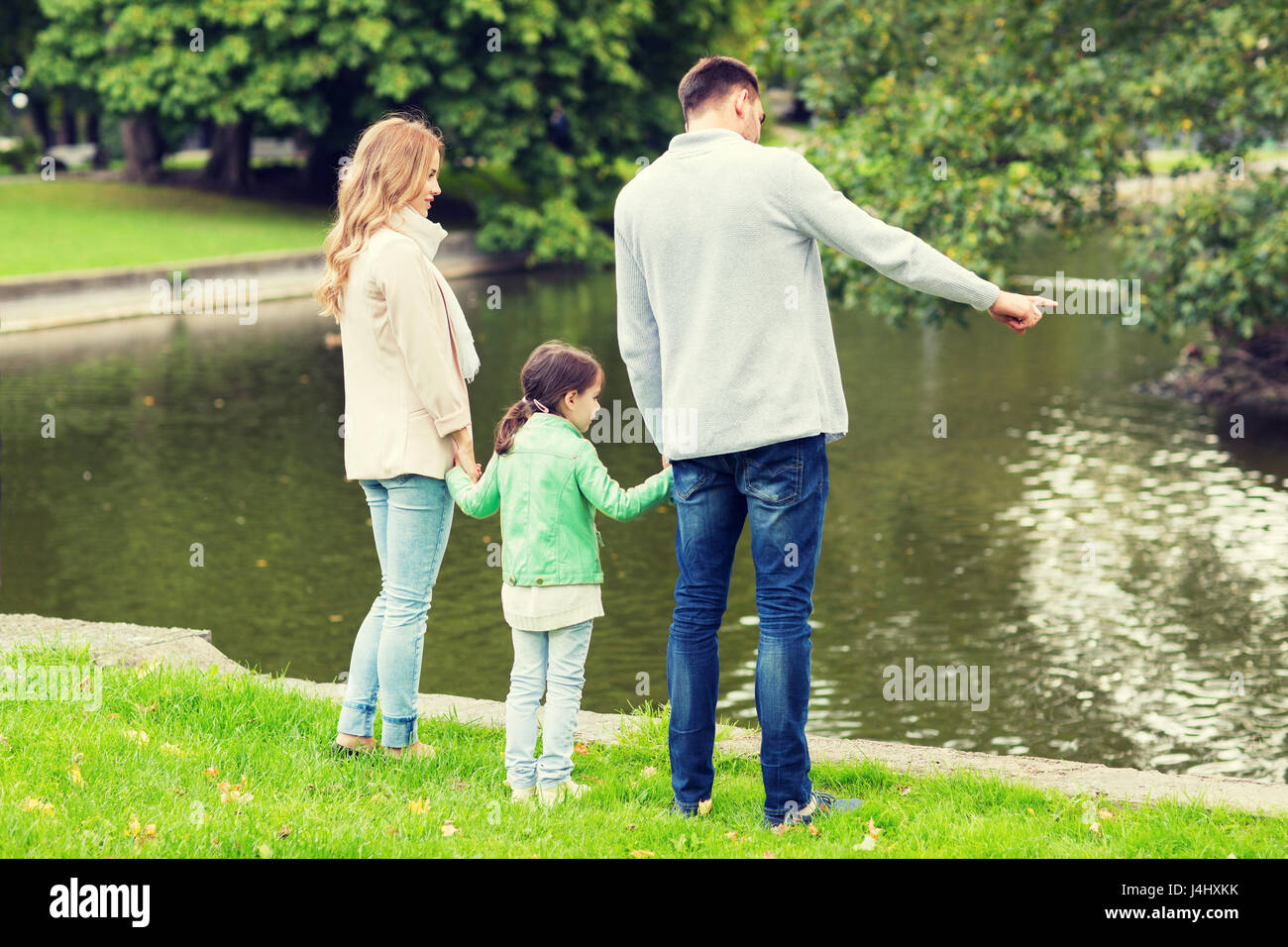 family walking in summer park Stock Photo - Alamy