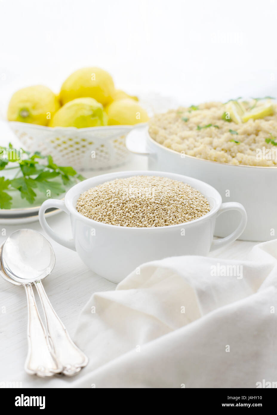 composition of uncooked Quinoa with cooked in the distances, in a ...