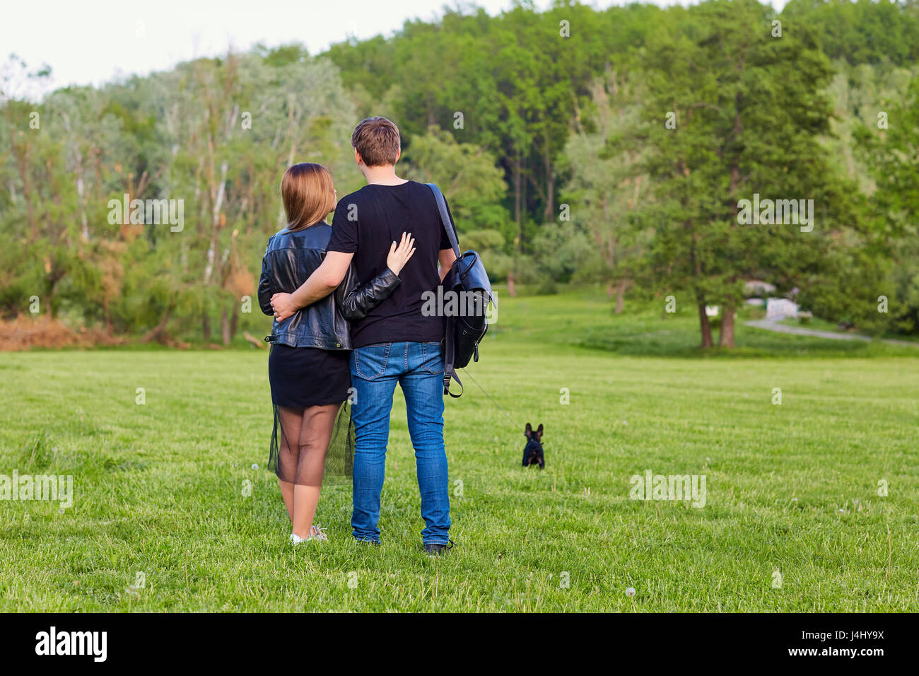 Embrace from behind hi-res stock photography and images - Alamy