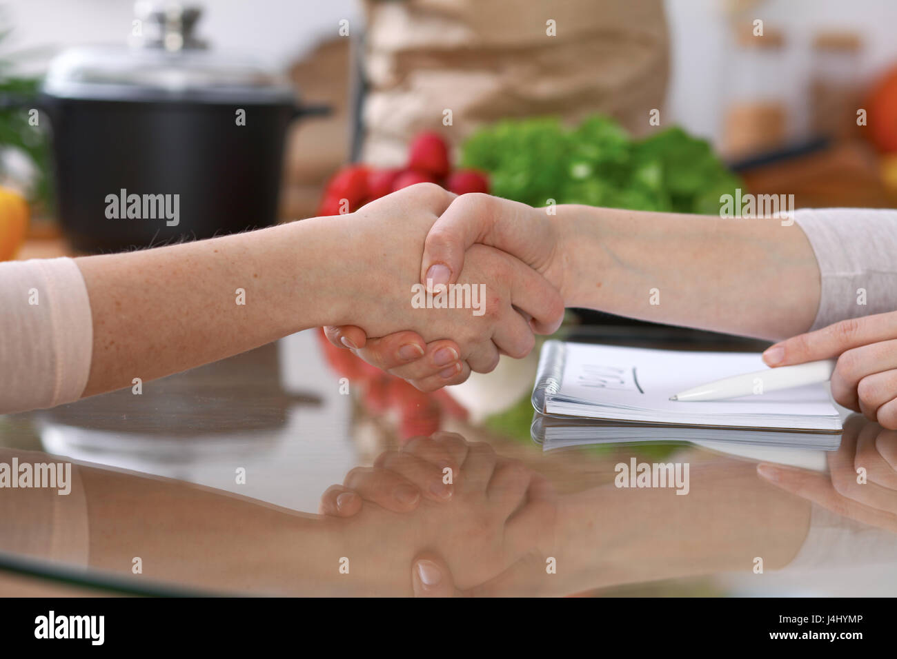 Cook kitchen shaking hands hi-res stock photography and images - Alamy