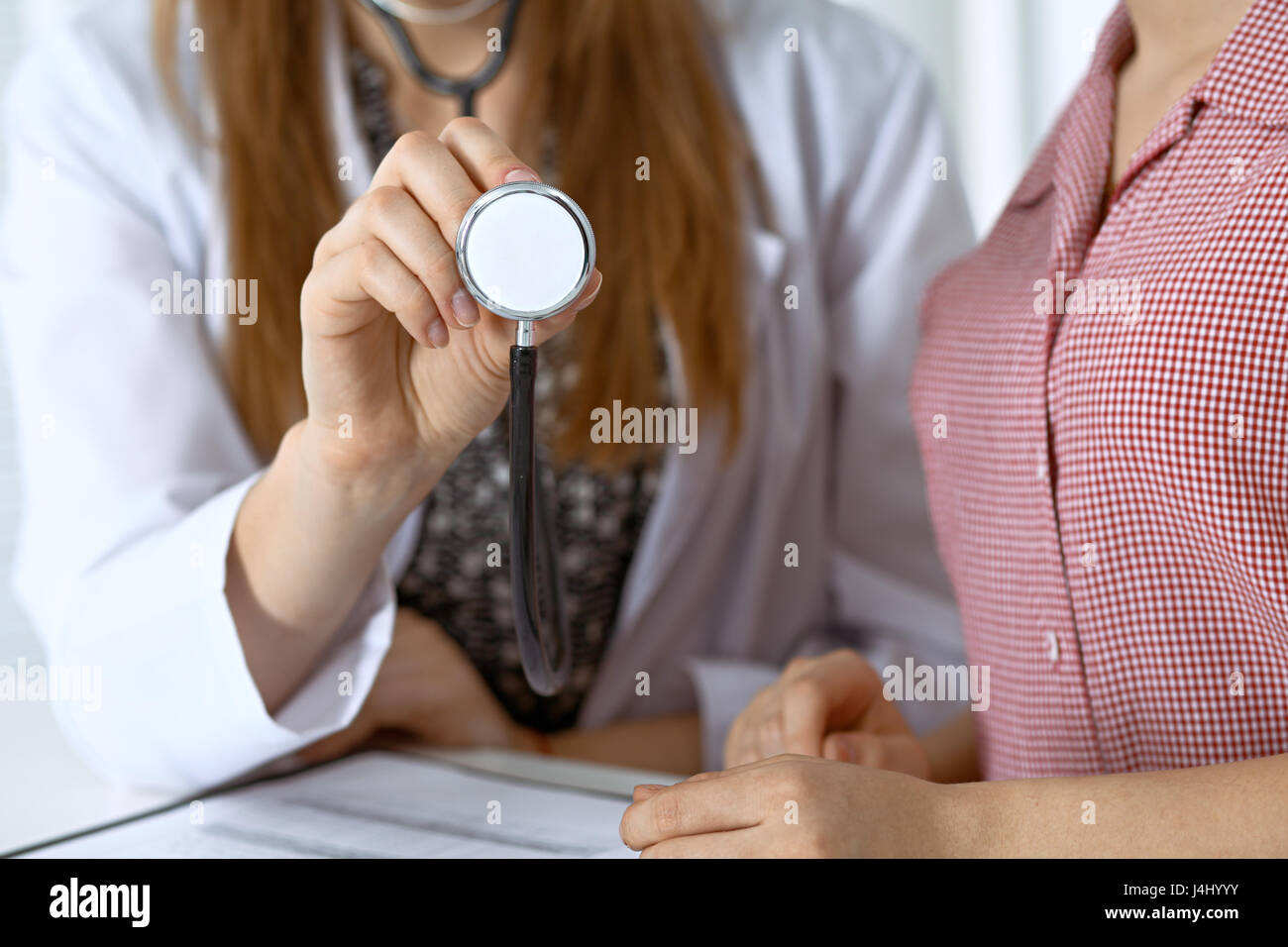 Doctor with a stethoscope in the hand. Physician is ready to examine ...