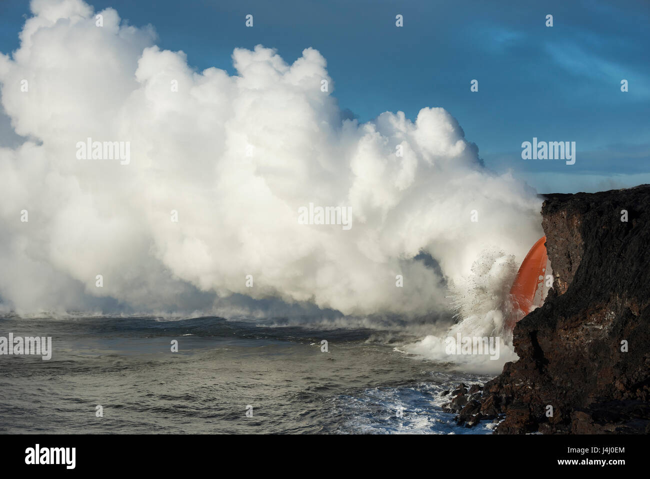 hot lava from the 61G flow from Kilauea Volcano enters the ocean from ...