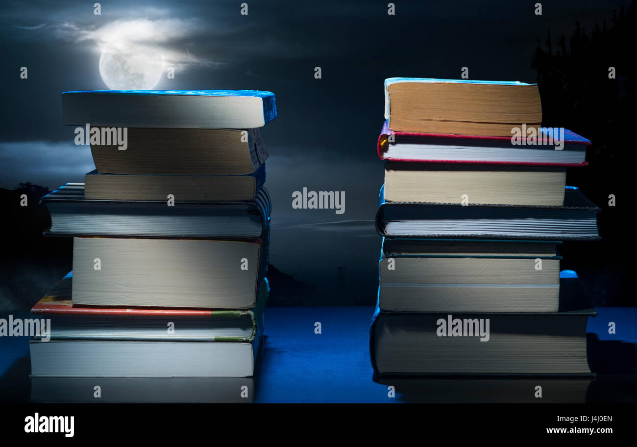 Books of the night Stock Photo - Alamy