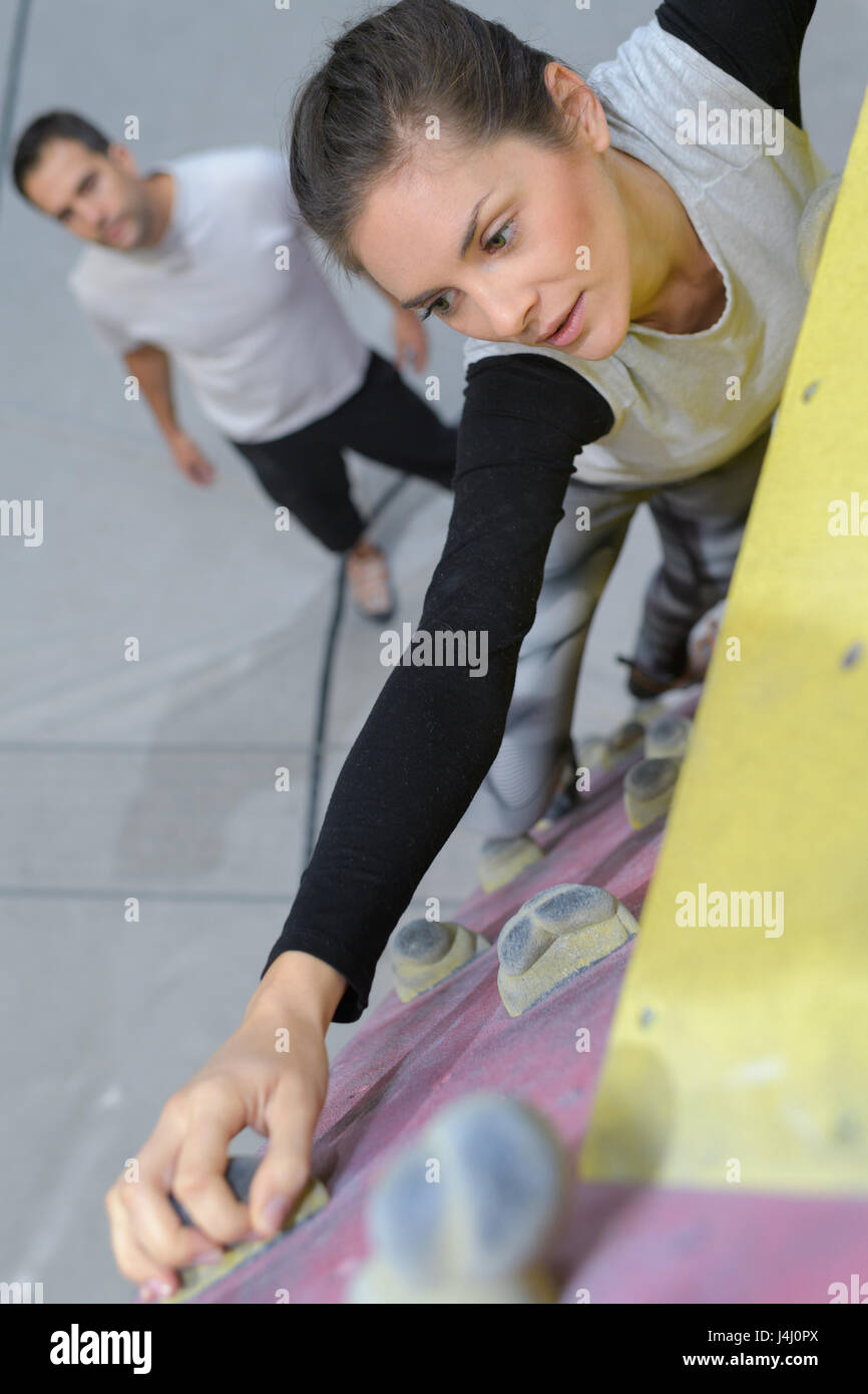 Lady climbing indoor wall hi-res stock photography and images - Alamy