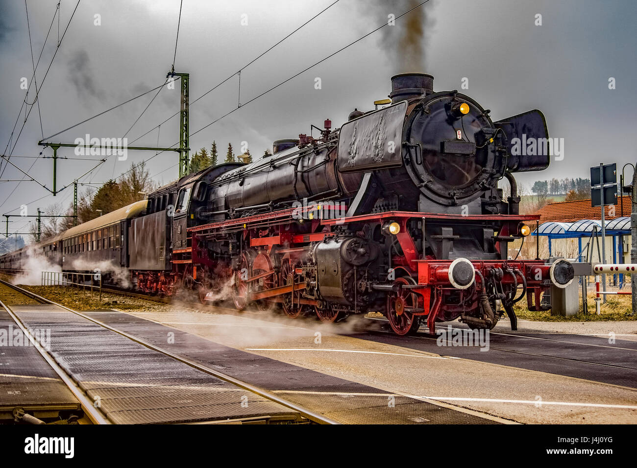 vintage black steam powered railway train Stock Photo - Alamy