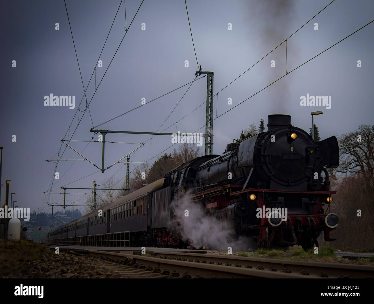 vintage black steam powered railway train Stock Photo - Alamy