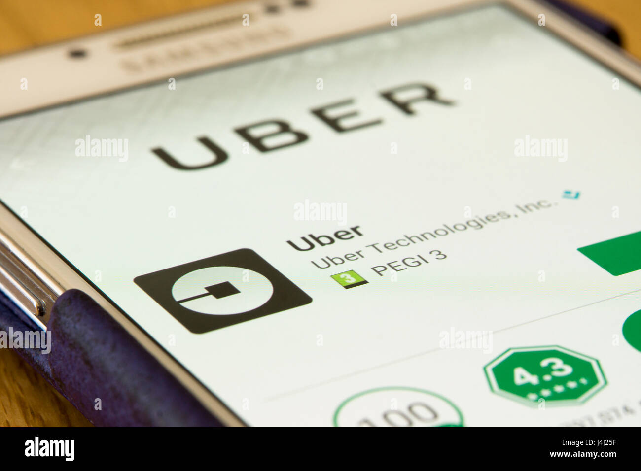 A close up on the Uber app installation screen Stock Photo - Alamy
