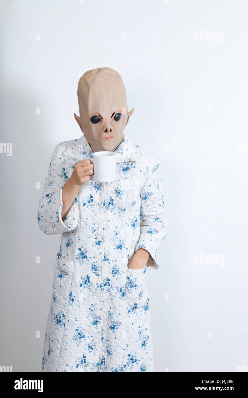 Alien difficult to wake in the morning Rubbing one's eyes and drinking ...