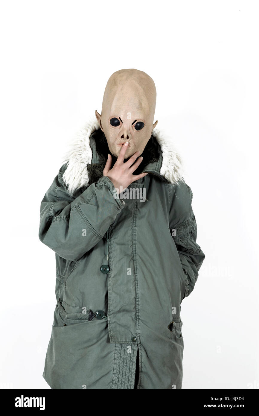 Alien wearing a military coat with hood fake fur Stock Photo - Alamy