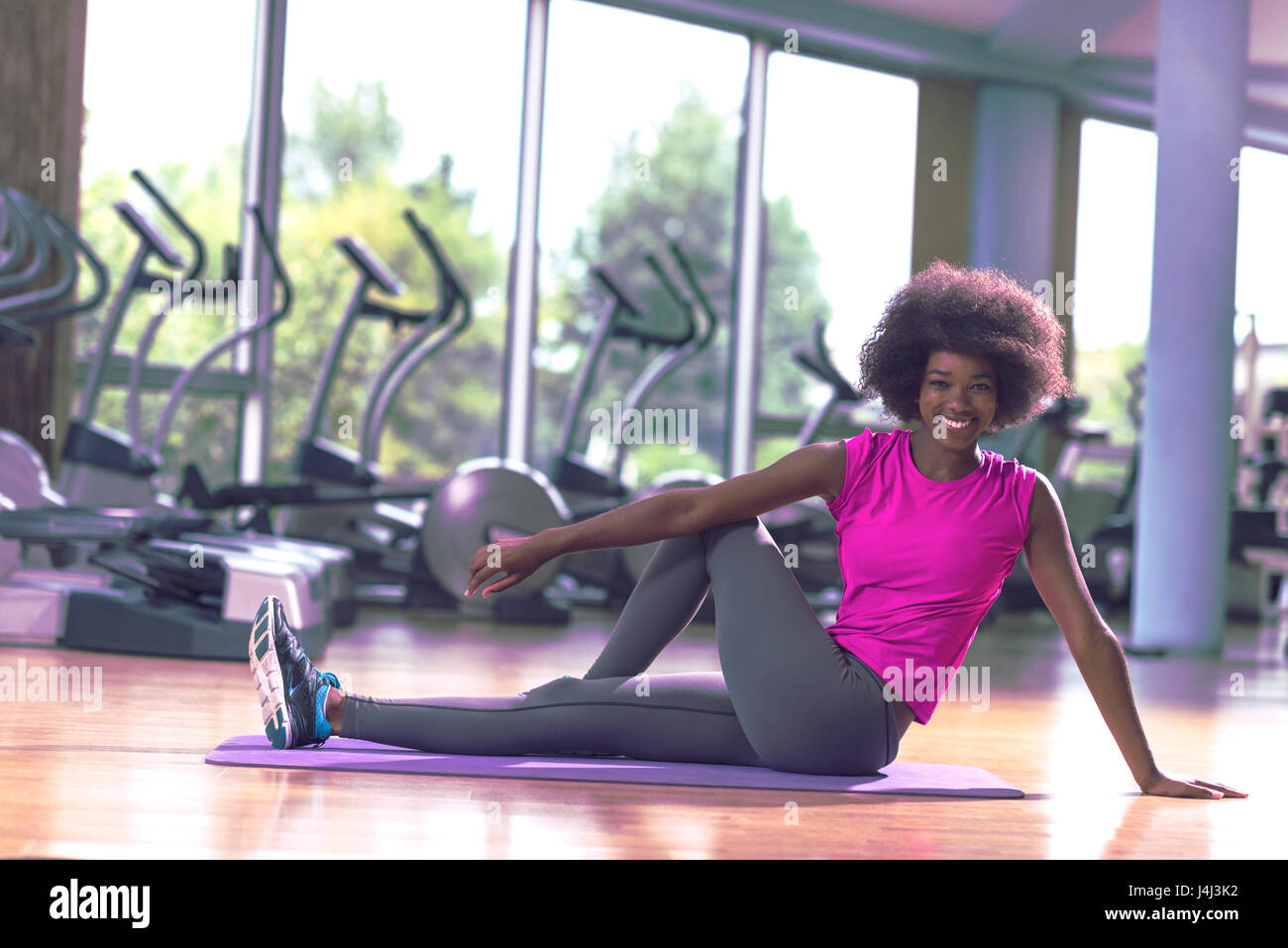 beautiful young african american woman exercise yoga in gym Stock Photo ...