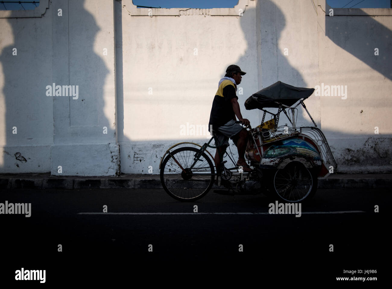 Trisikad trishaw traditional transport hi-res stock photography and ...
