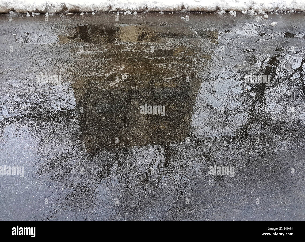 Big puddles on the street hi-res stock photography and images - Alamy