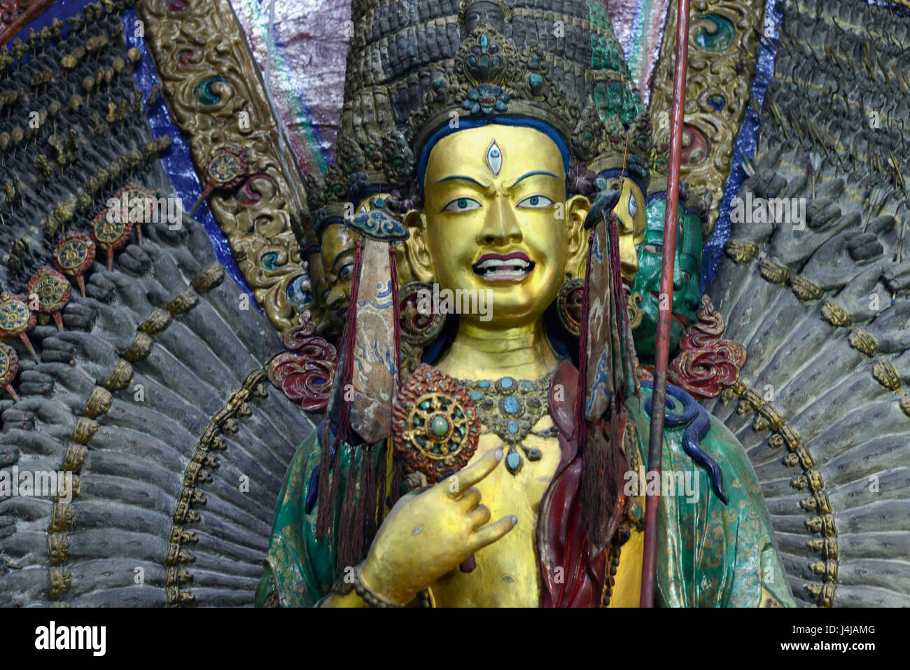 Gold sculpture of the female Buddhist deity Tara in the Tibetan ...