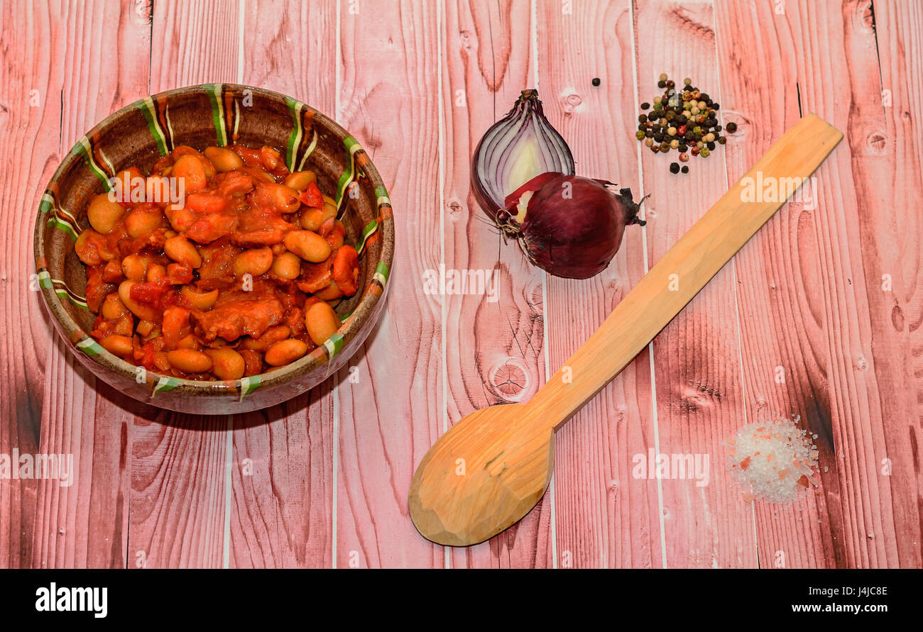 Romanian traditional food, beans with smoked pork (fasole cu ciolan ...