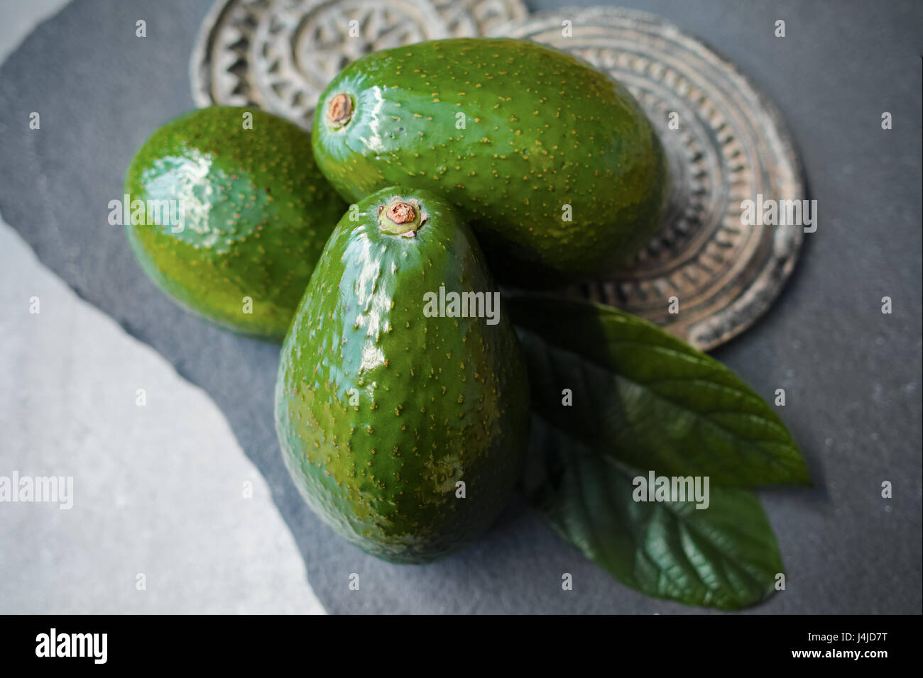 Green ripe tropical vegetable avocados ready to eat Stock Photo - Alamy