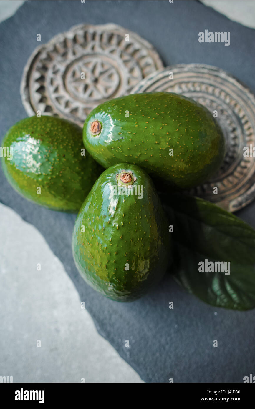 Green ripe tropical vegetable avocados ready to eat Stock Photo - Alamy