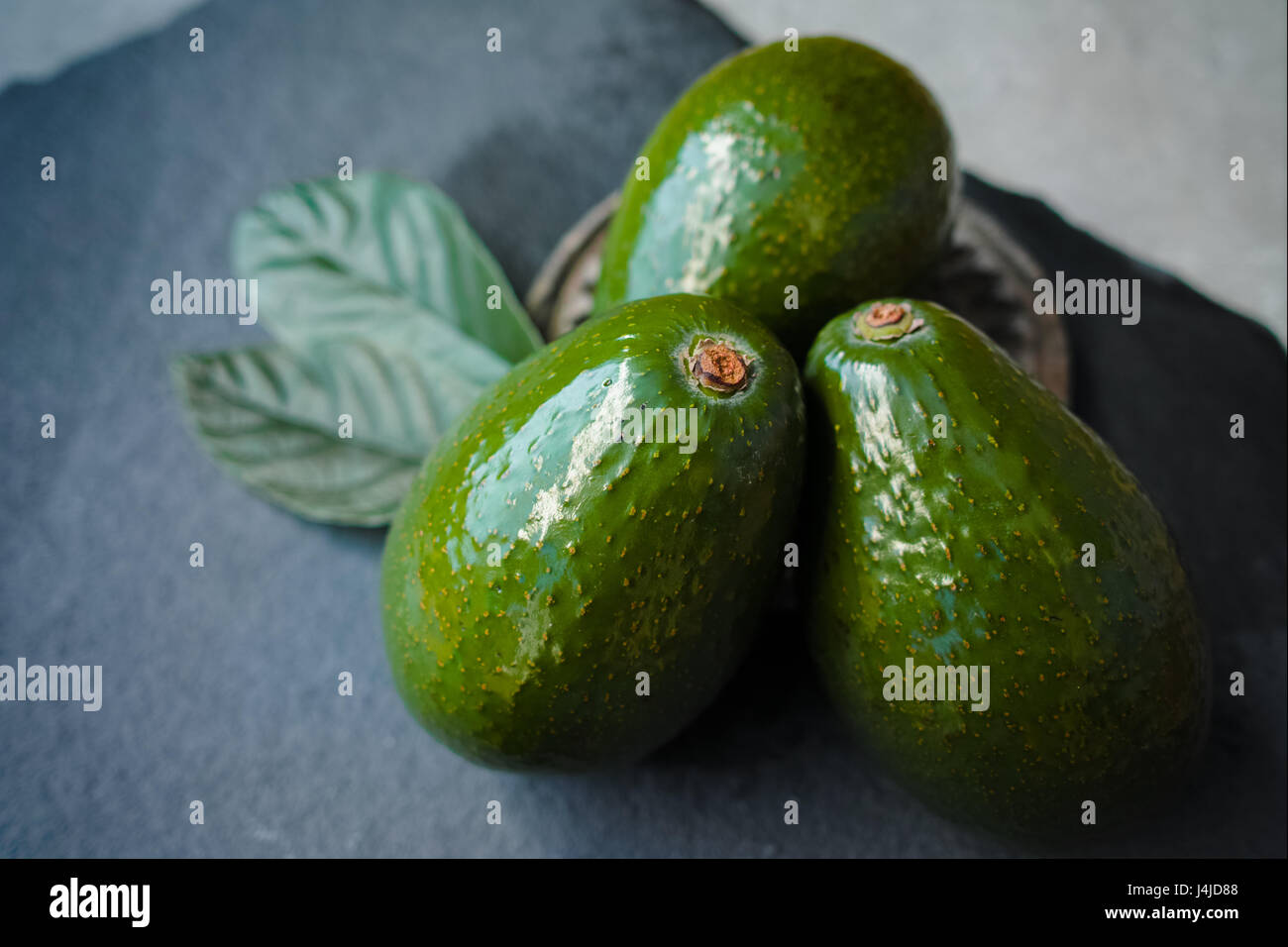 Green ripe tropical vegetable avocados ready to eat Stock Photo - Alamy