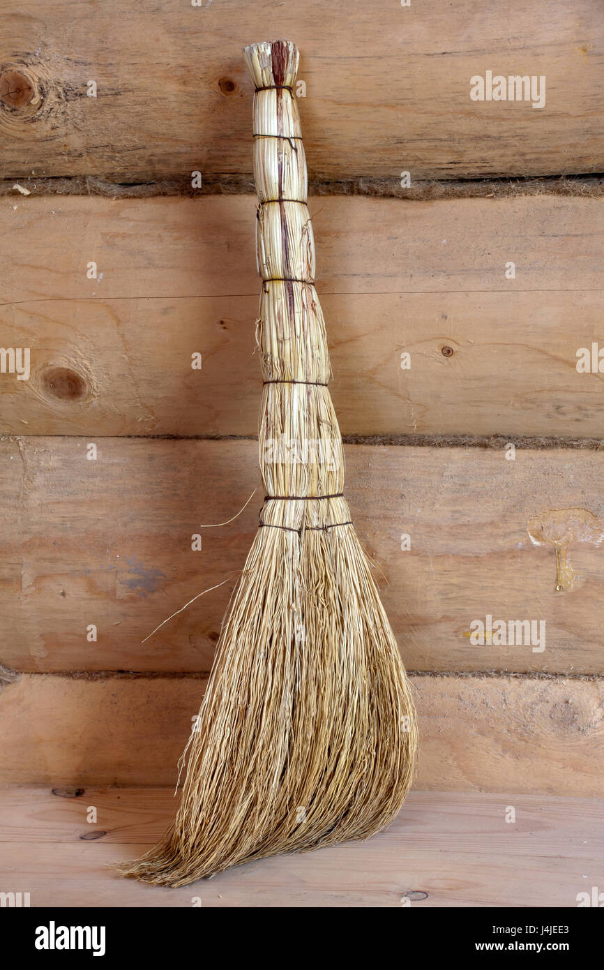 broom in a log house Stock Photo - Alamy