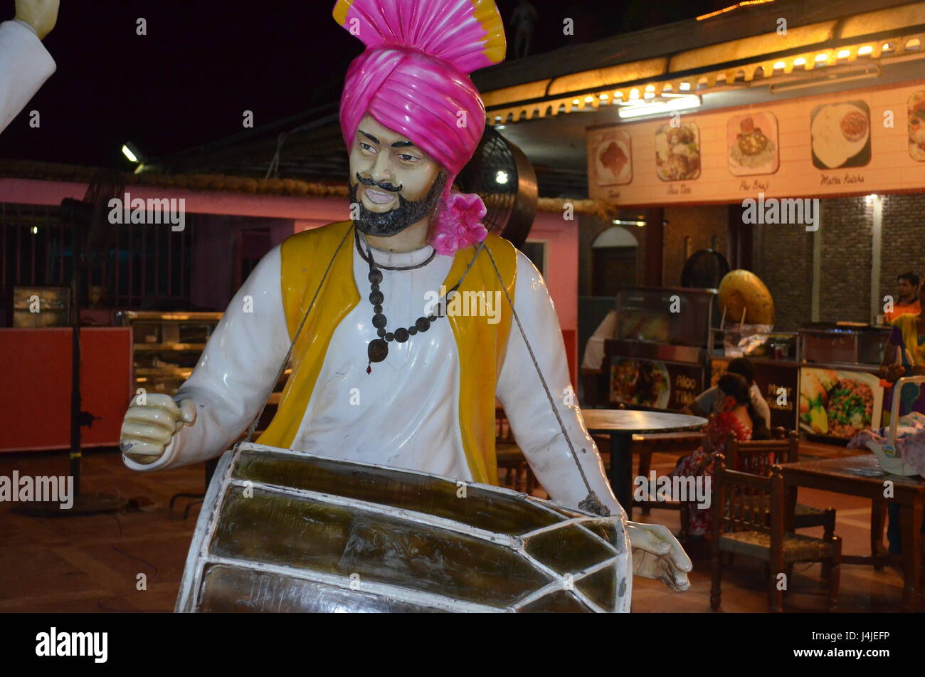 Statue of punjabi man dancing Stock Photo - Alamy