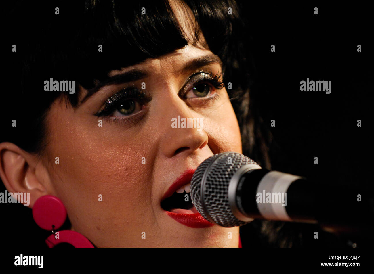 Singer Katy Perry performing at her CD release party for One Of The ...