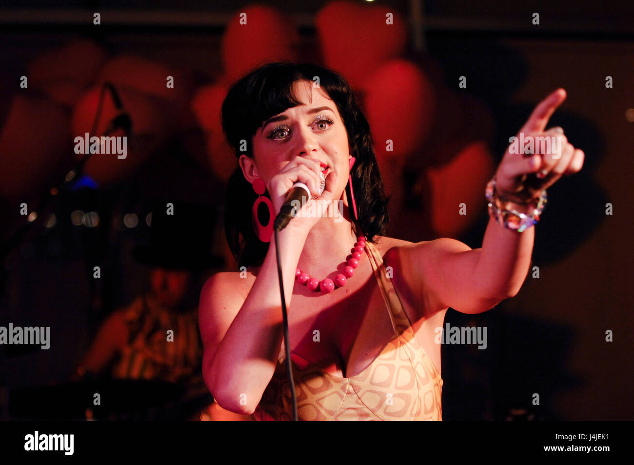 Singer Katy Perry performing at her CD release party for One Of The ...