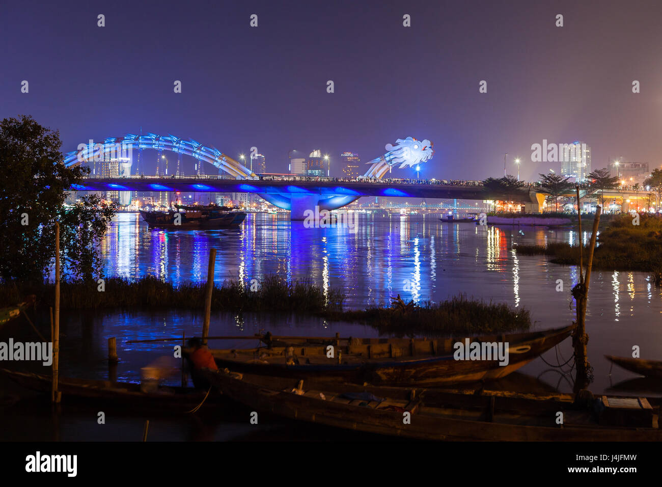 DA NANG, VIETNAM - March 12, 2017: illuminated Dragon River Bridge over ...