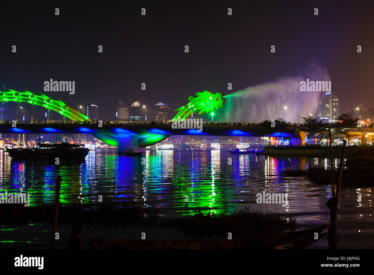 DA NANG, VIETNAM - March 12, 2017: illuminated Dragon River Bridge over ...