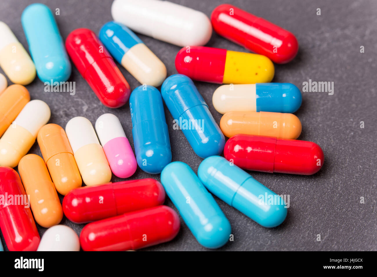 different Tablets pills capsule heap mix therapy drugs Stock Photo - Alamy