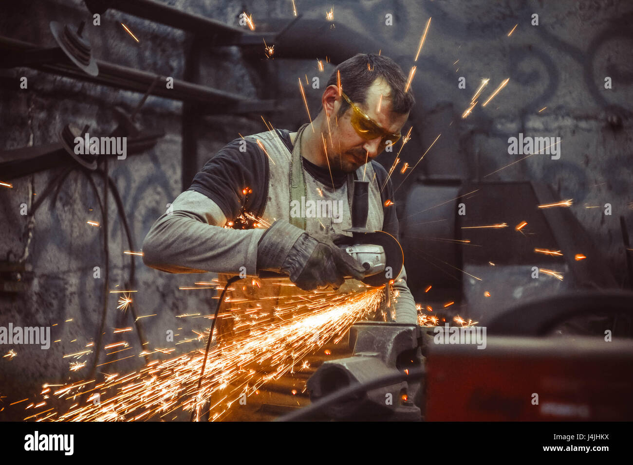 worker sawing the iron Stock Photo - Alamy
