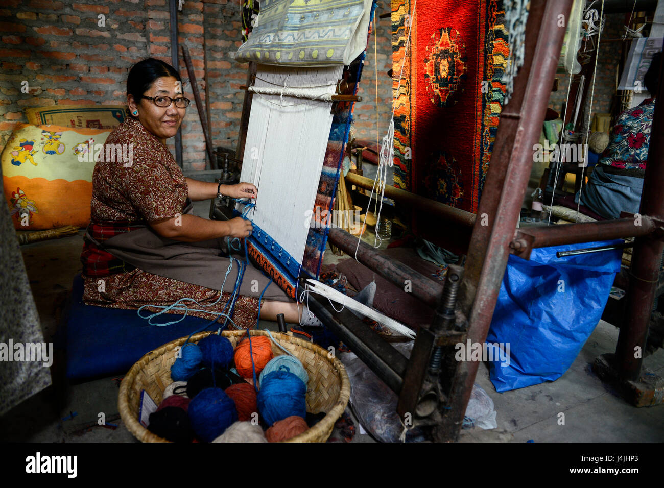 Rug weaver nepal hi-res stock photography and images - Alamy